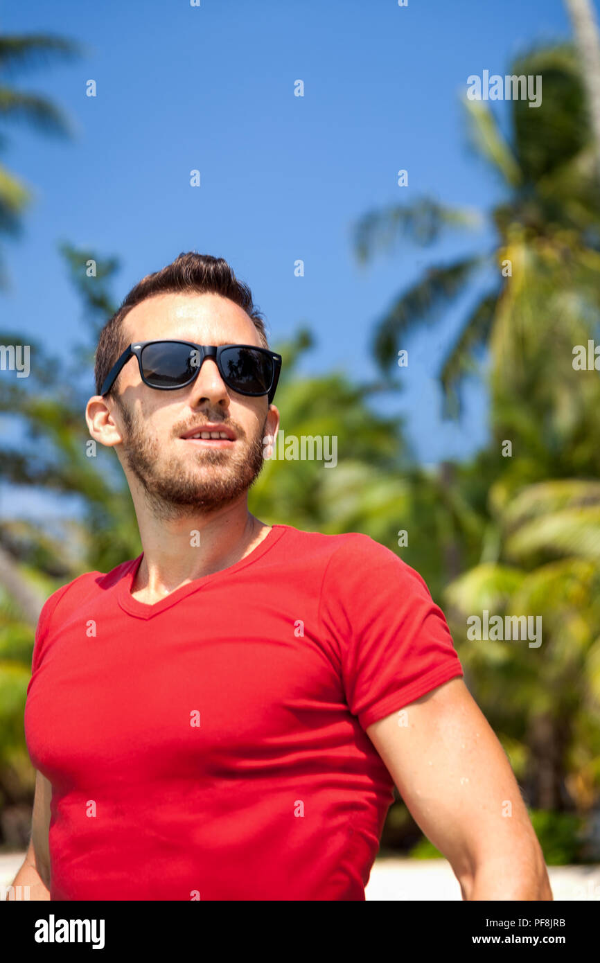 Portrait travel men enjoy vacation on tropical beach Stock Photo - Alamy