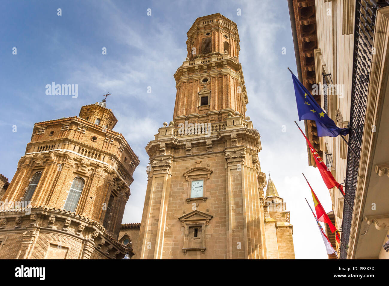 Cathedral tower and flags in the historic center of Tudela, Spain Stock ...