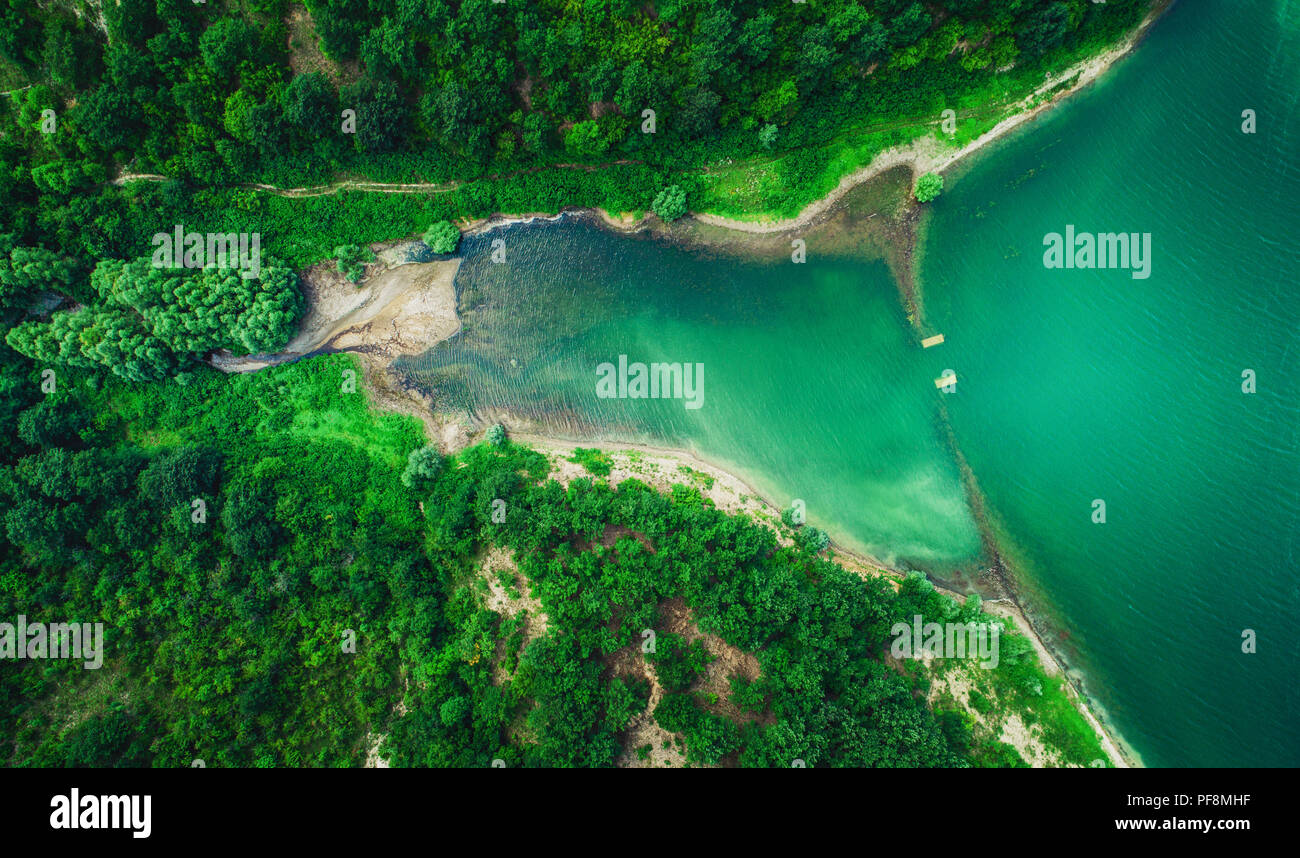 Lake in the mountain forest, aerial top view Stock Photo - Alamy