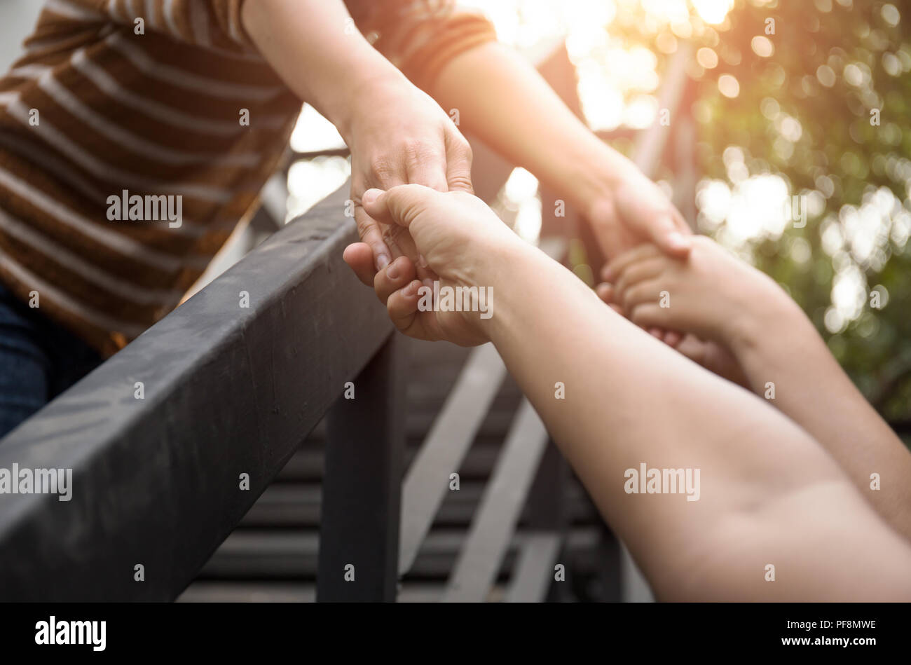 Helping behavior hi-res stock photography and images - Alamy