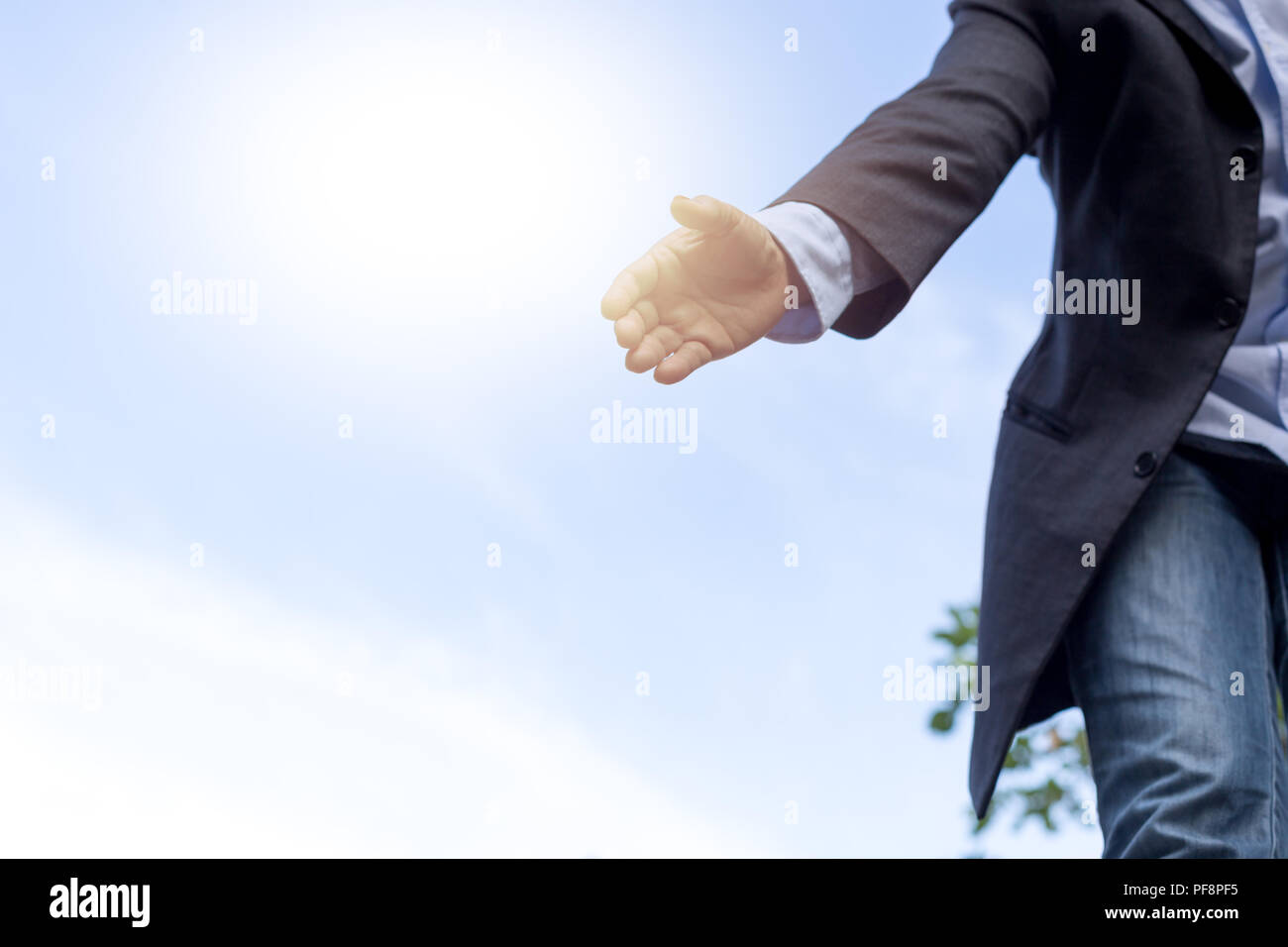 Help concept hand reaching out to help someone with blue sky Stock ...