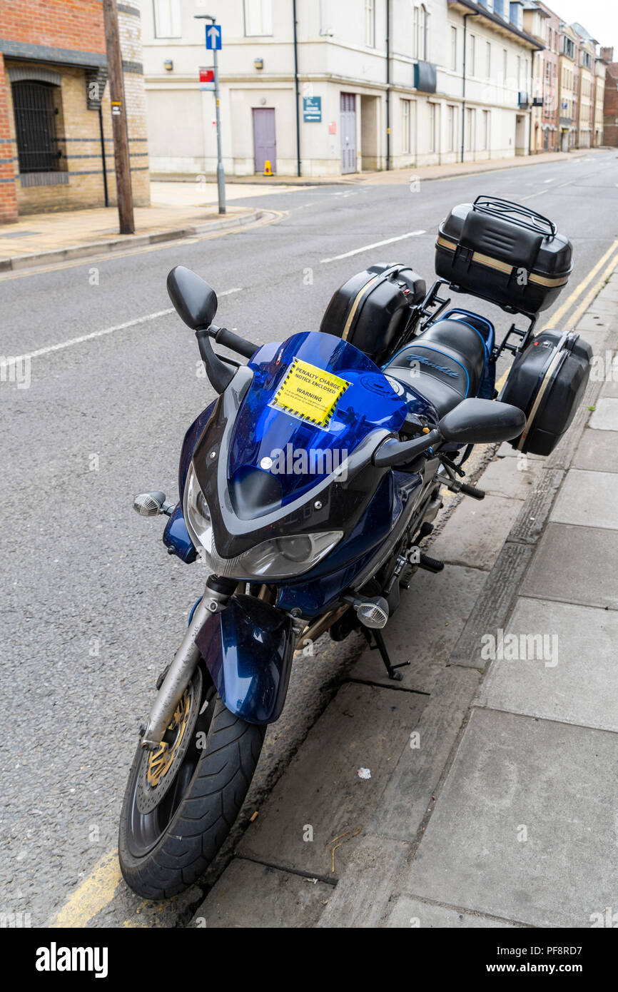 Parking ticket on motorcycle screen Stock Photo - Alamy
