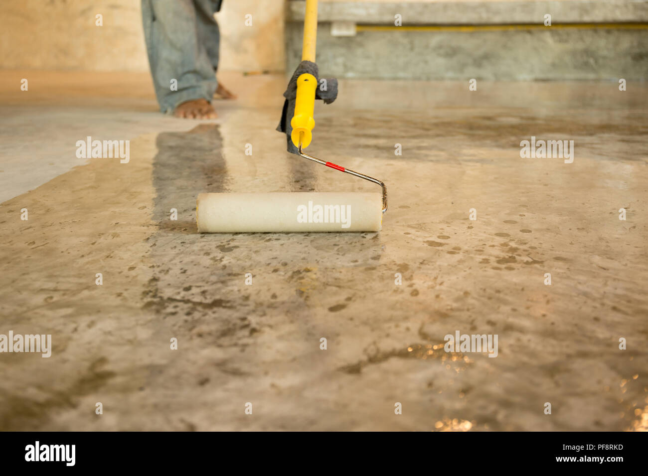Applying coating hi-res stock photography and images - Alamy
