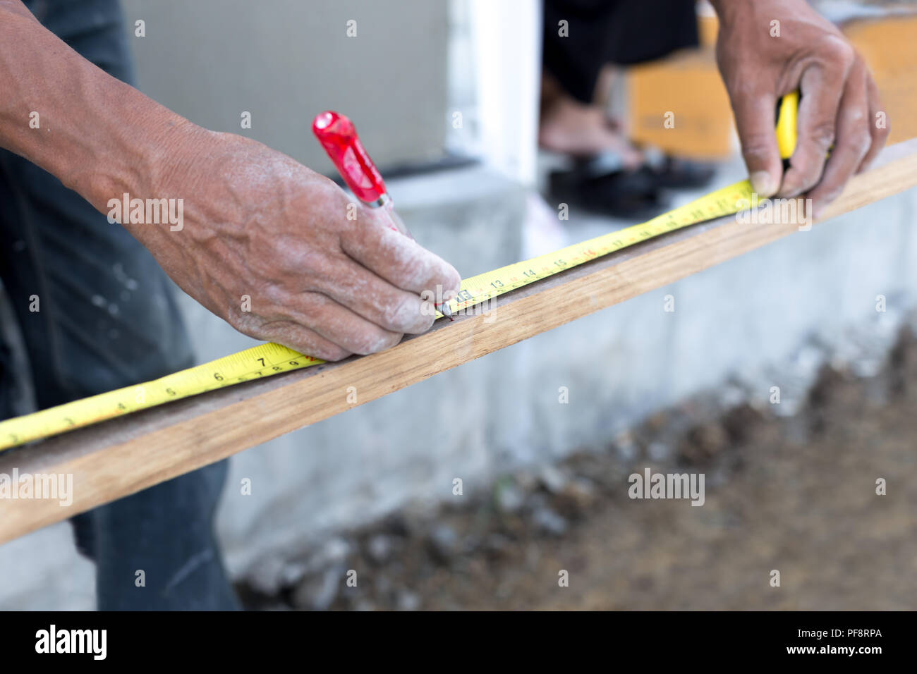 Carpenter hand measuring tape with pencil Stock Photo - Alamy