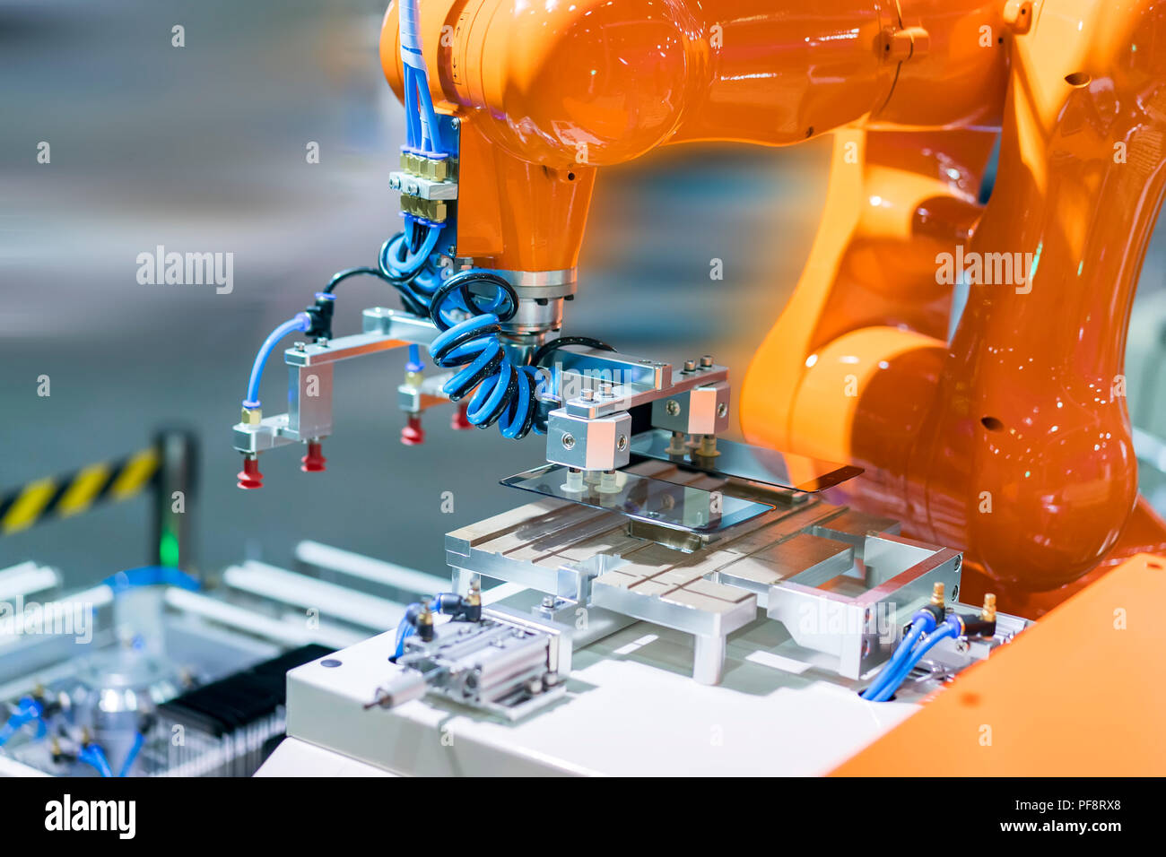 robotic screen protector film or glass cover in manufacture phone ...