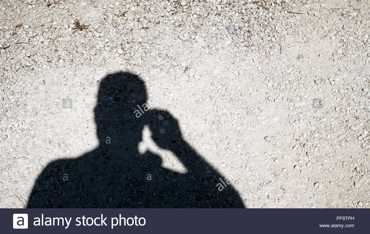 Man Shadow On White Wall Stock Photos & Man Shadow On White Wall Stock ...