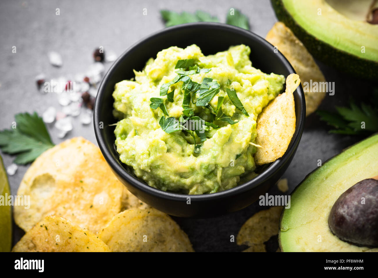 Traditional latinamerican mexican sauce guacamole chips and ingredients ...