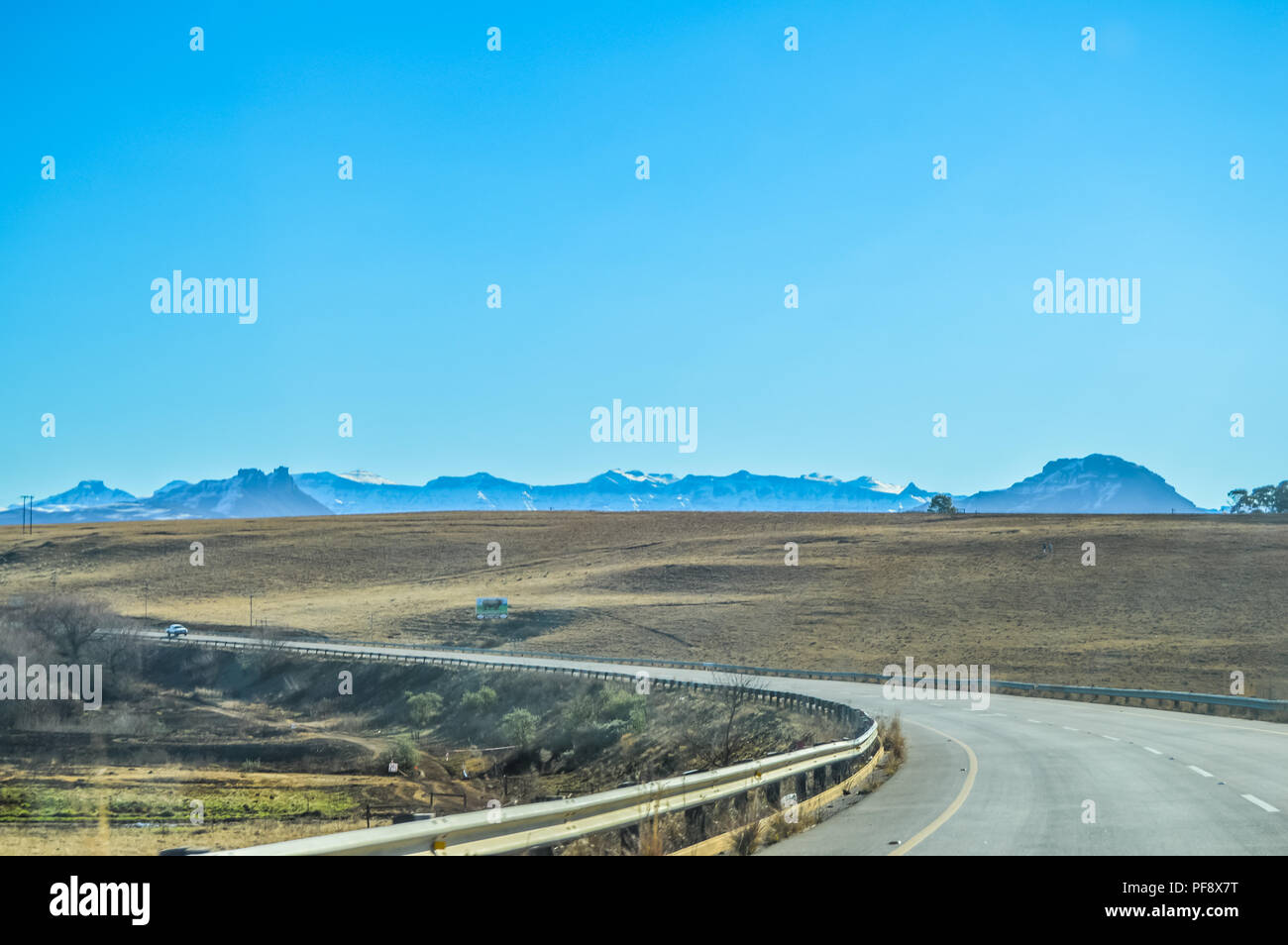 Landscape of Underberg , a small countryside village with snow clad ...