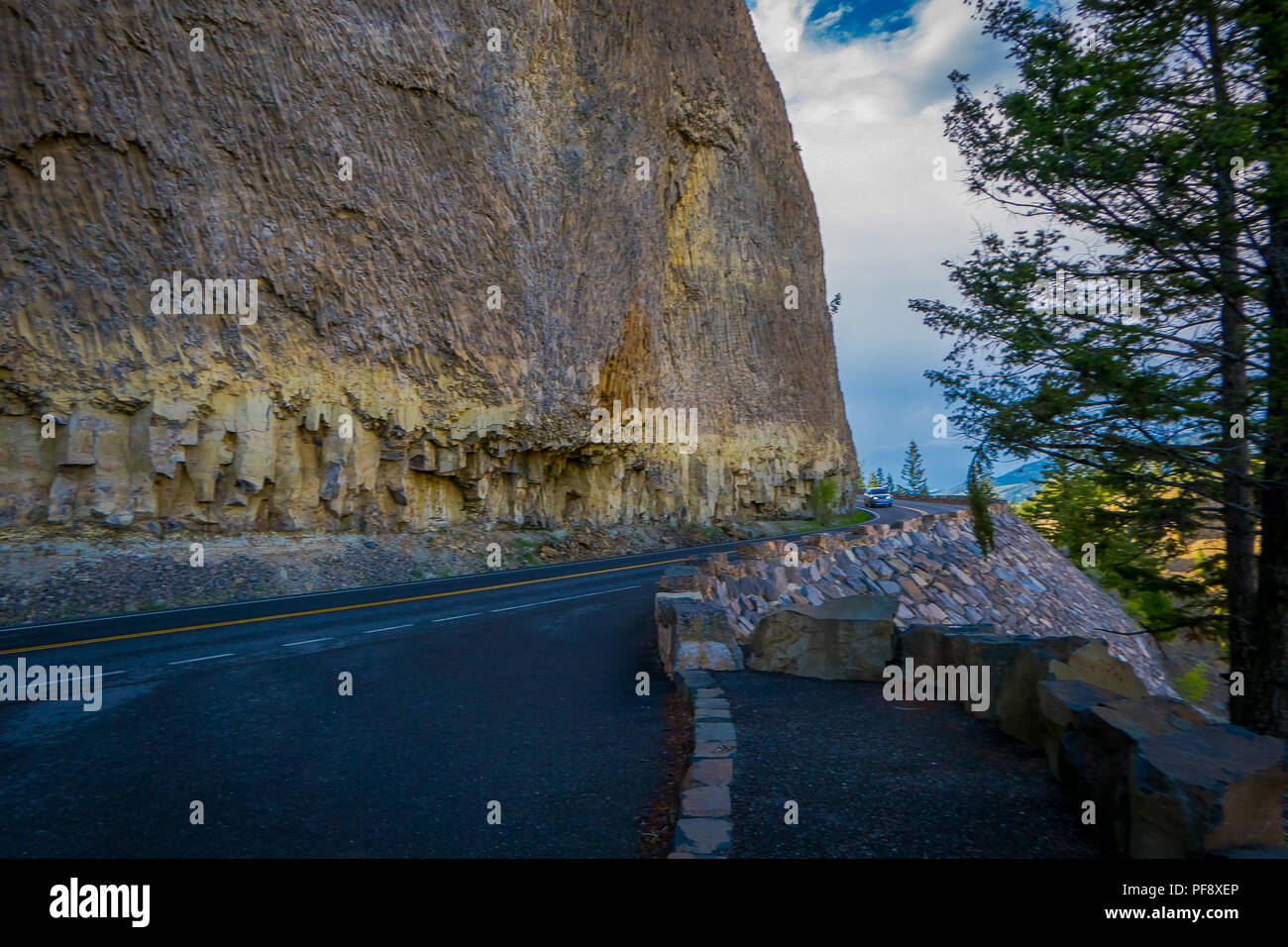 Yellowstone's Grand Loop Road passes through the Golden Gate surrounded ...