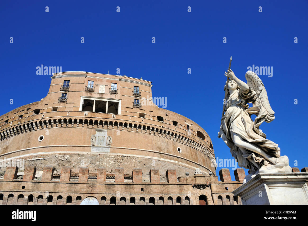 Statue of an angel and detail of the Old fortress Angel's Castle Rome ...