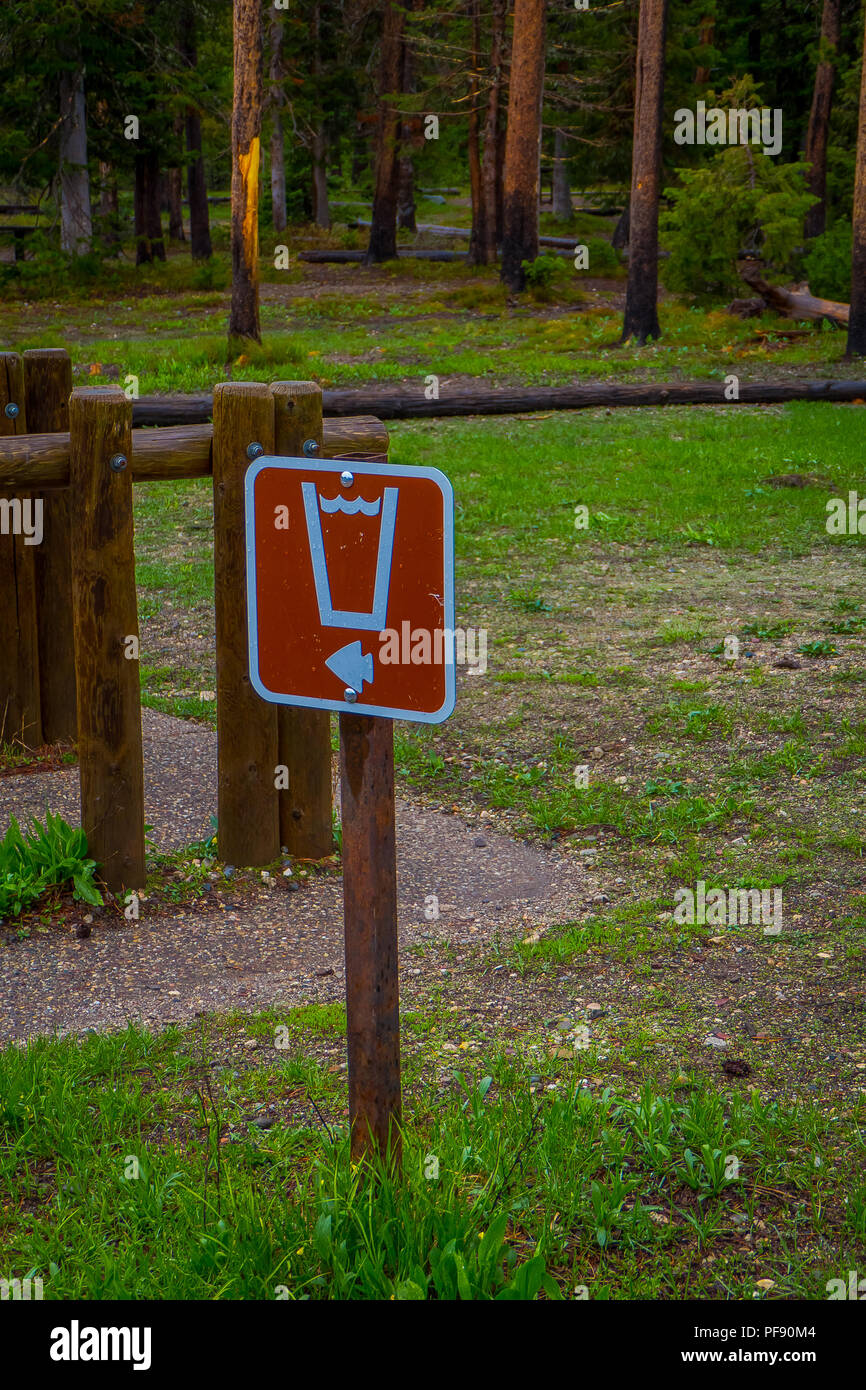 Outdoor view of informative sign located at Grand Teton camp in United ...