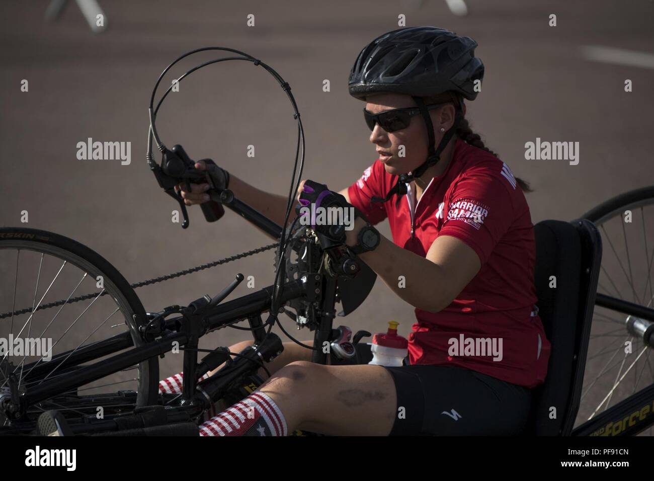 Team Marine Corps veteran Cpl. Tisha Knickerbocker powers a hand cycle ...