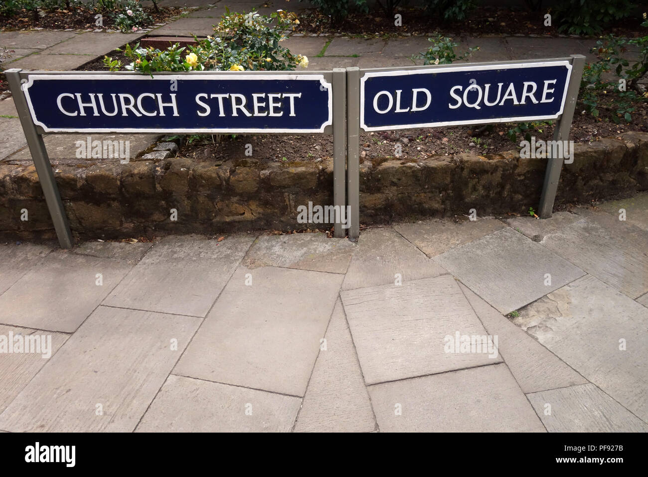 Merging roads and two Church street, Old Street road name signs in the ...