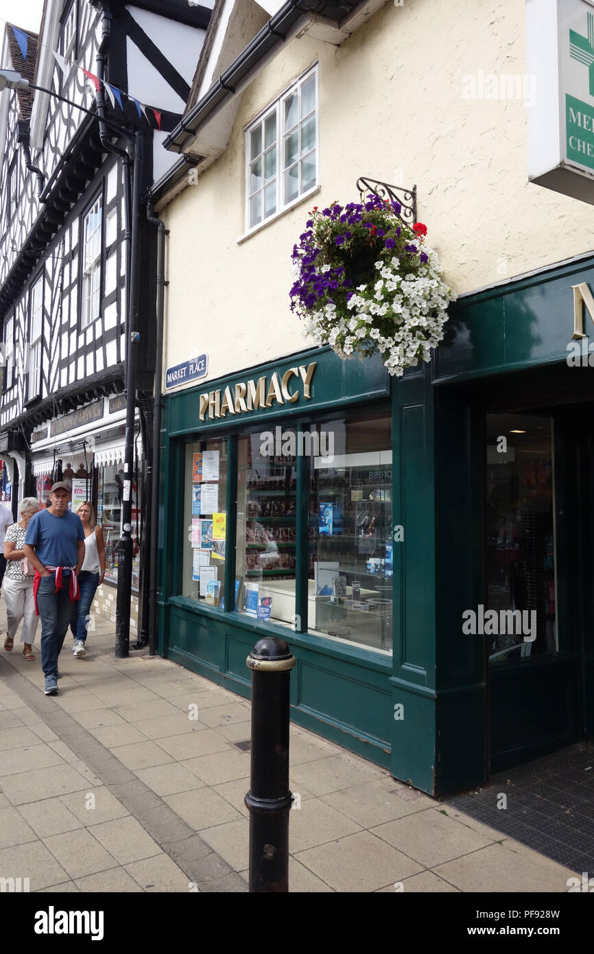 Pretty pharmacy shop front in the pedestrian area of the busy market ...