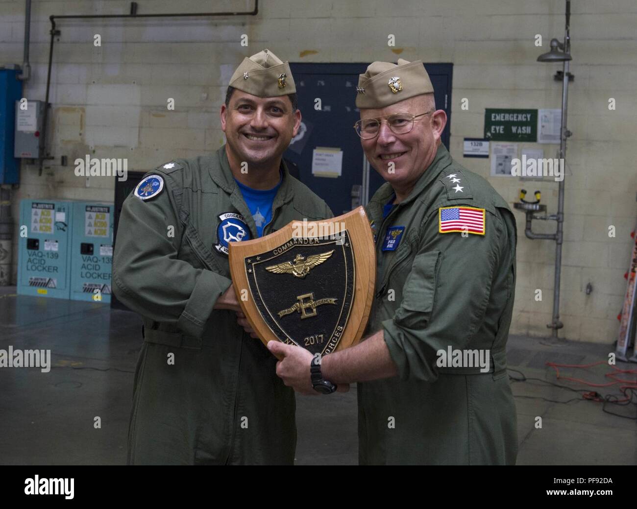 OAK HARBOR, Wash. (June 7, 2018) Vice Adm. Dewolfe Miller presents the ...
