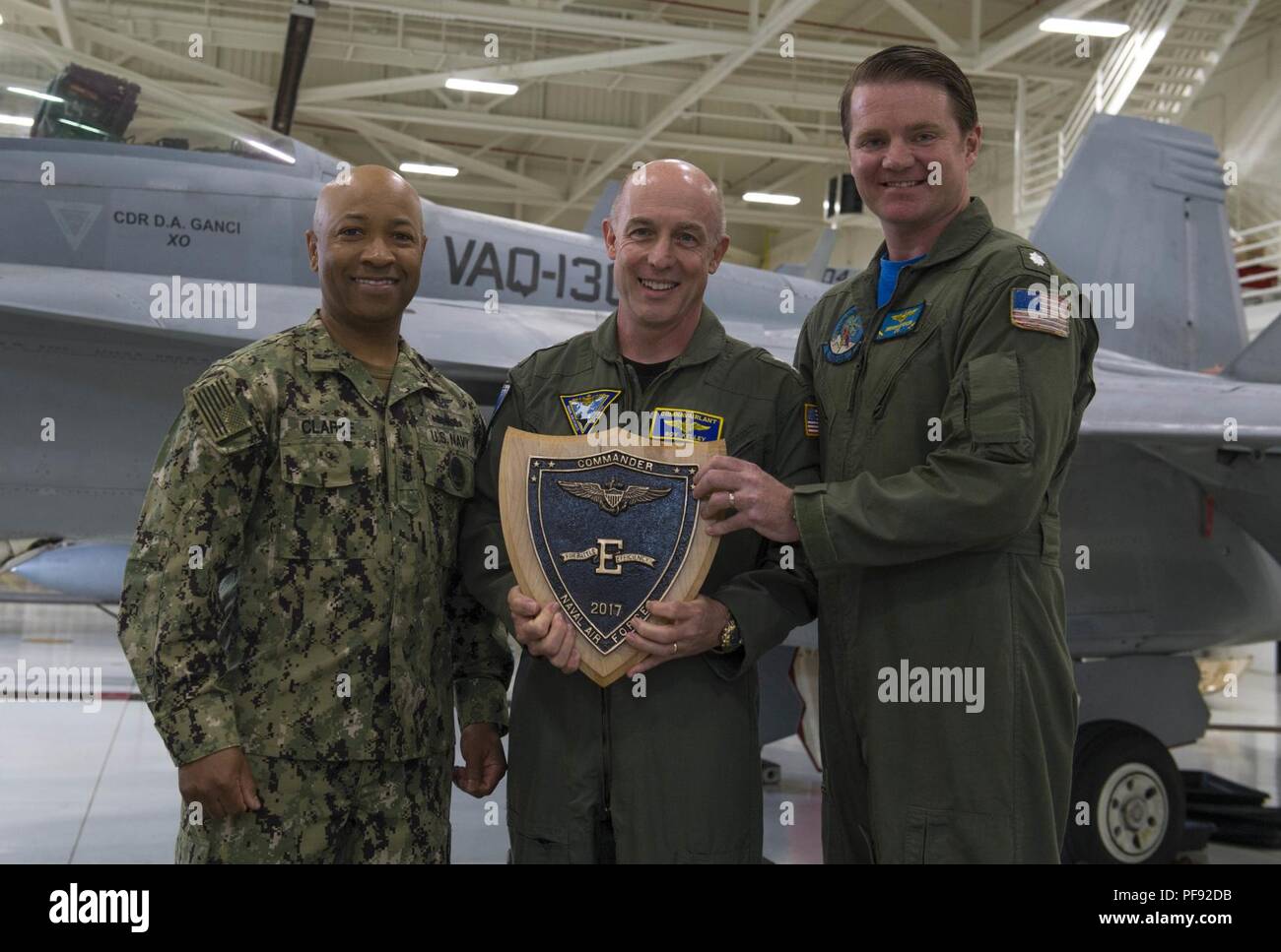 OAK HARBOR, Wash. (June 7, 2018) Rear Adm. Roy Kelley presents the ...