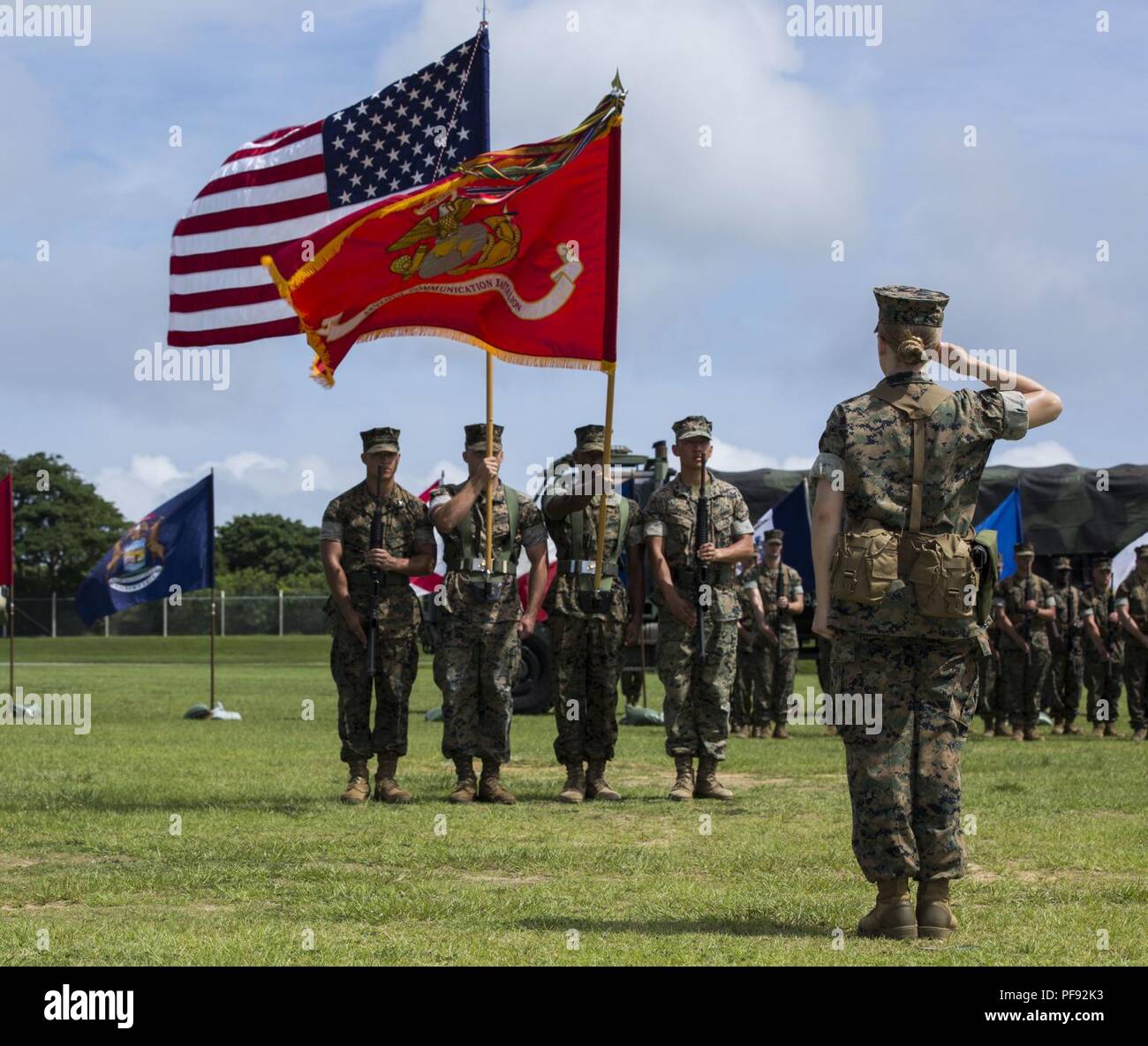 CAMP HANSEN, OKINAWA, Japan – 2nd LT. Kerry M. Haller salutes the ...