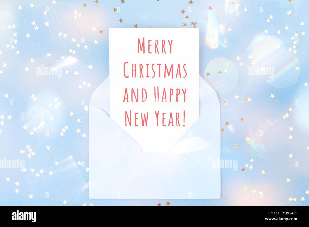 Christmas card in blue envelope on blue background decorated with ...