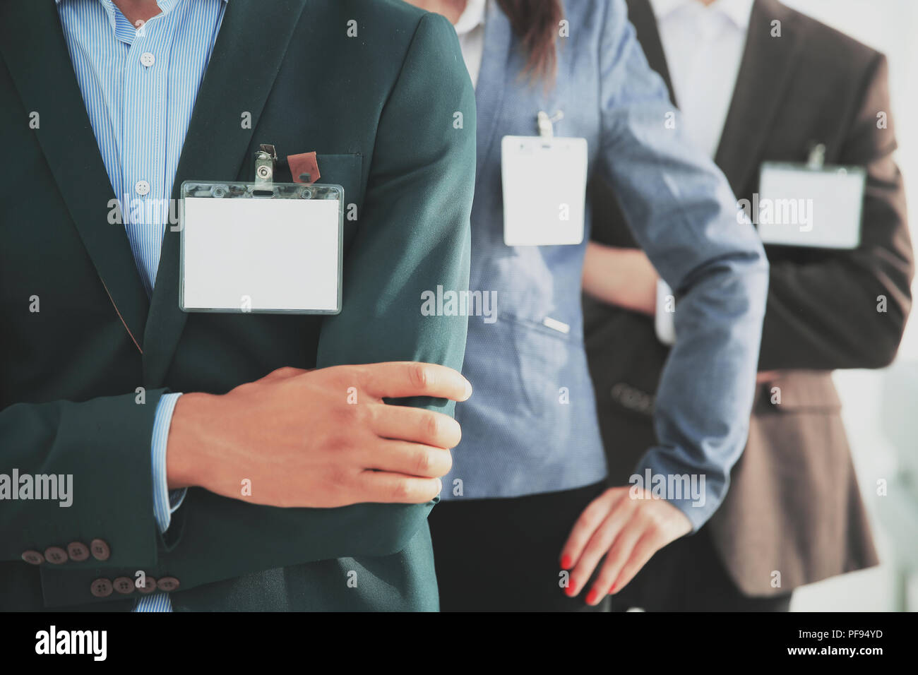 People wearing name badges hi-res stock photography and images - Alamy