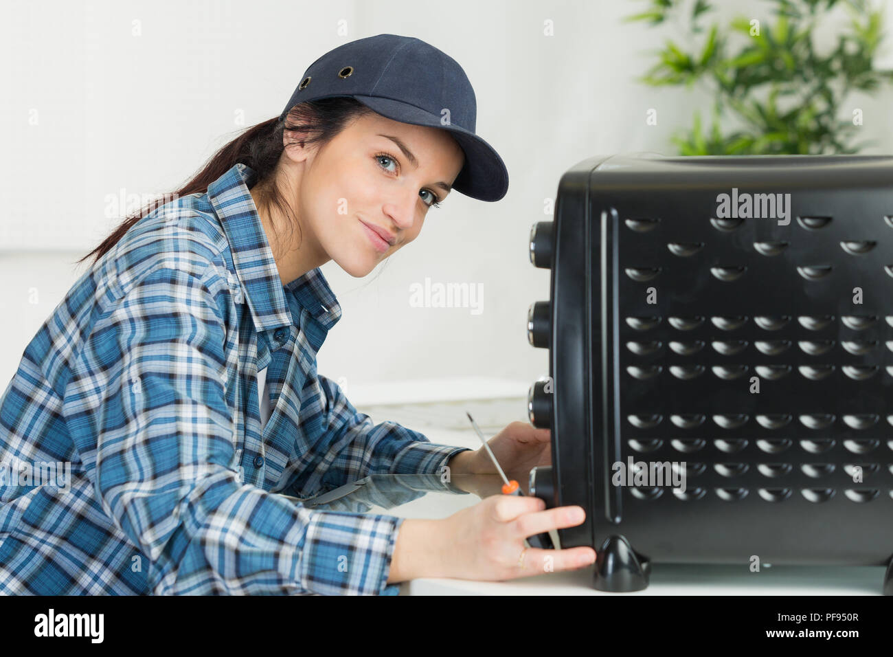 female oven technician Stock Photo - Alamy