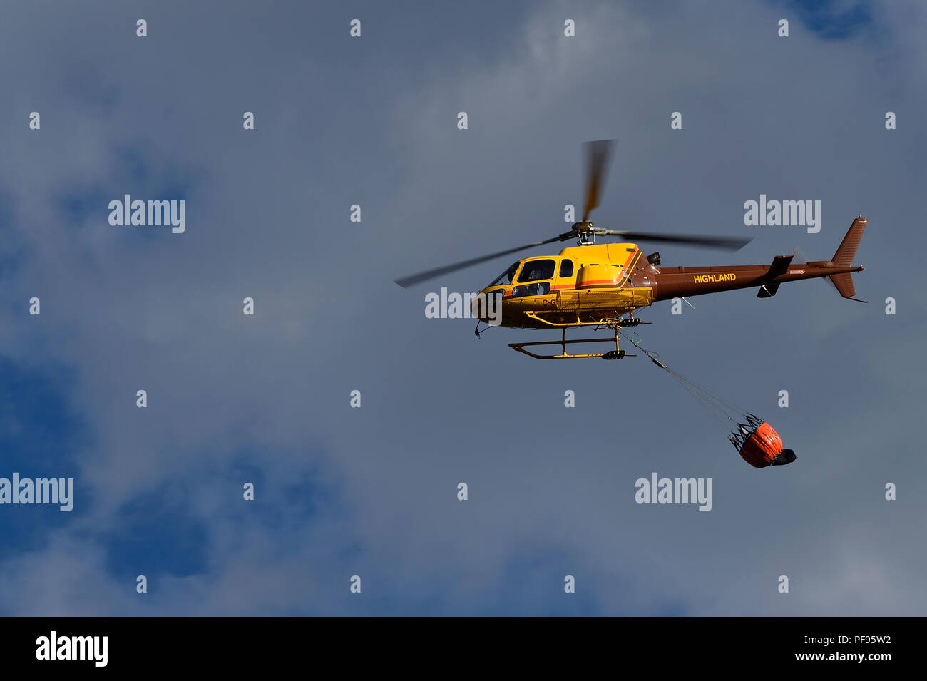 Red and yellow helicopter hi-res stock photography and images - Alamy