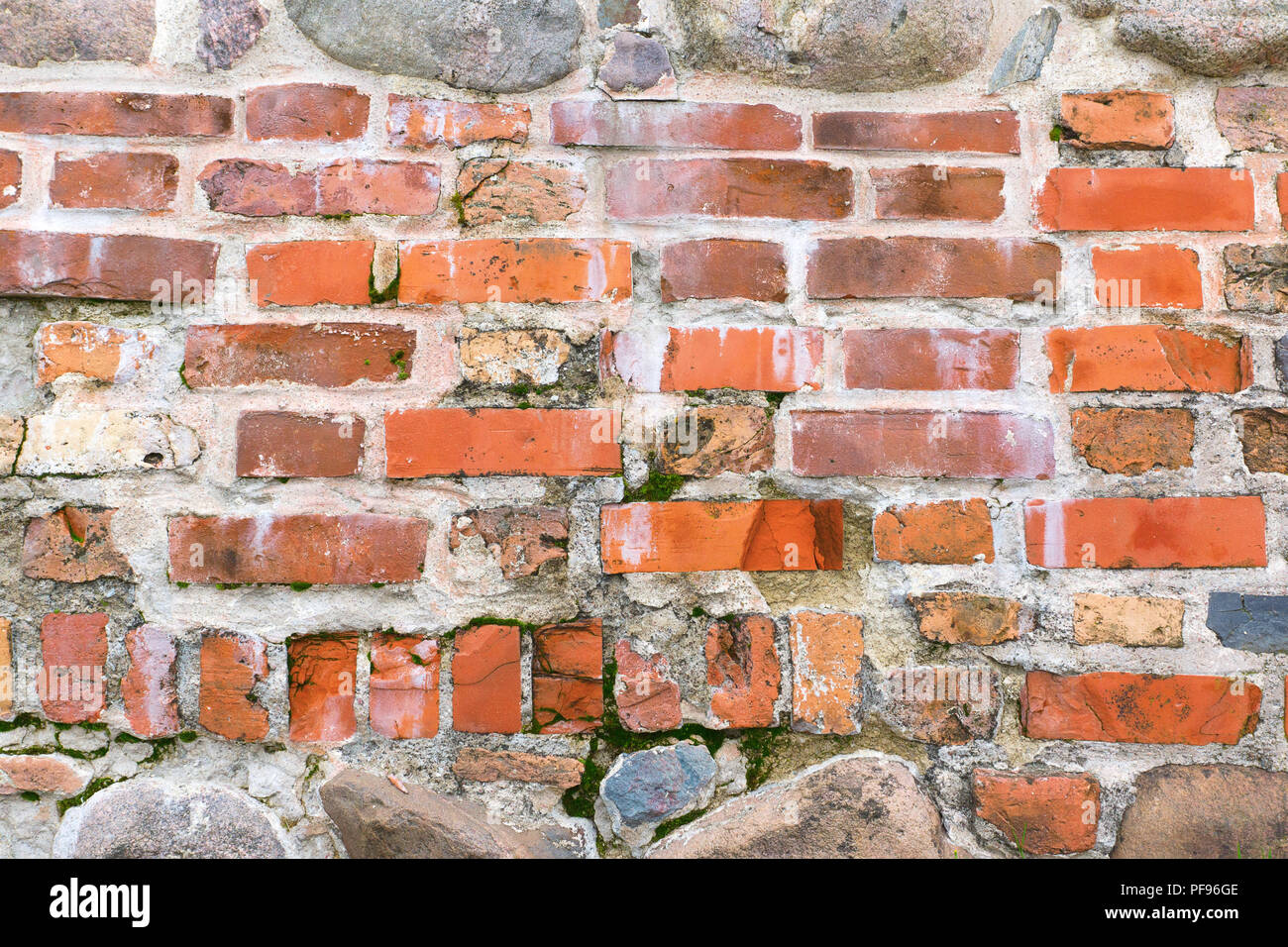 texture of a wall lined with bricks through a cement slurry Stock Photo ...
