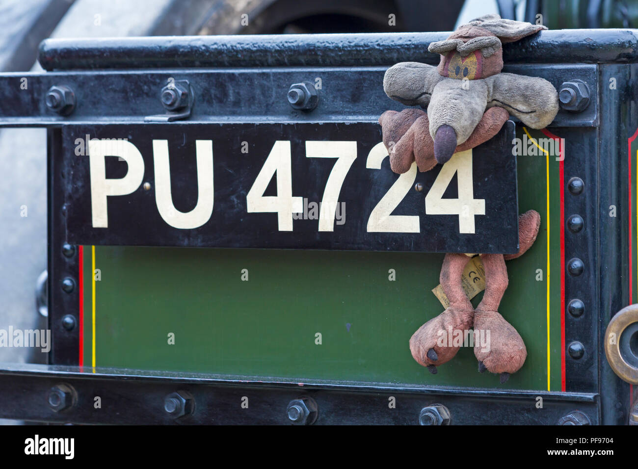 Dirty soft toy squashed behind number plate on steam engine at Horton ...