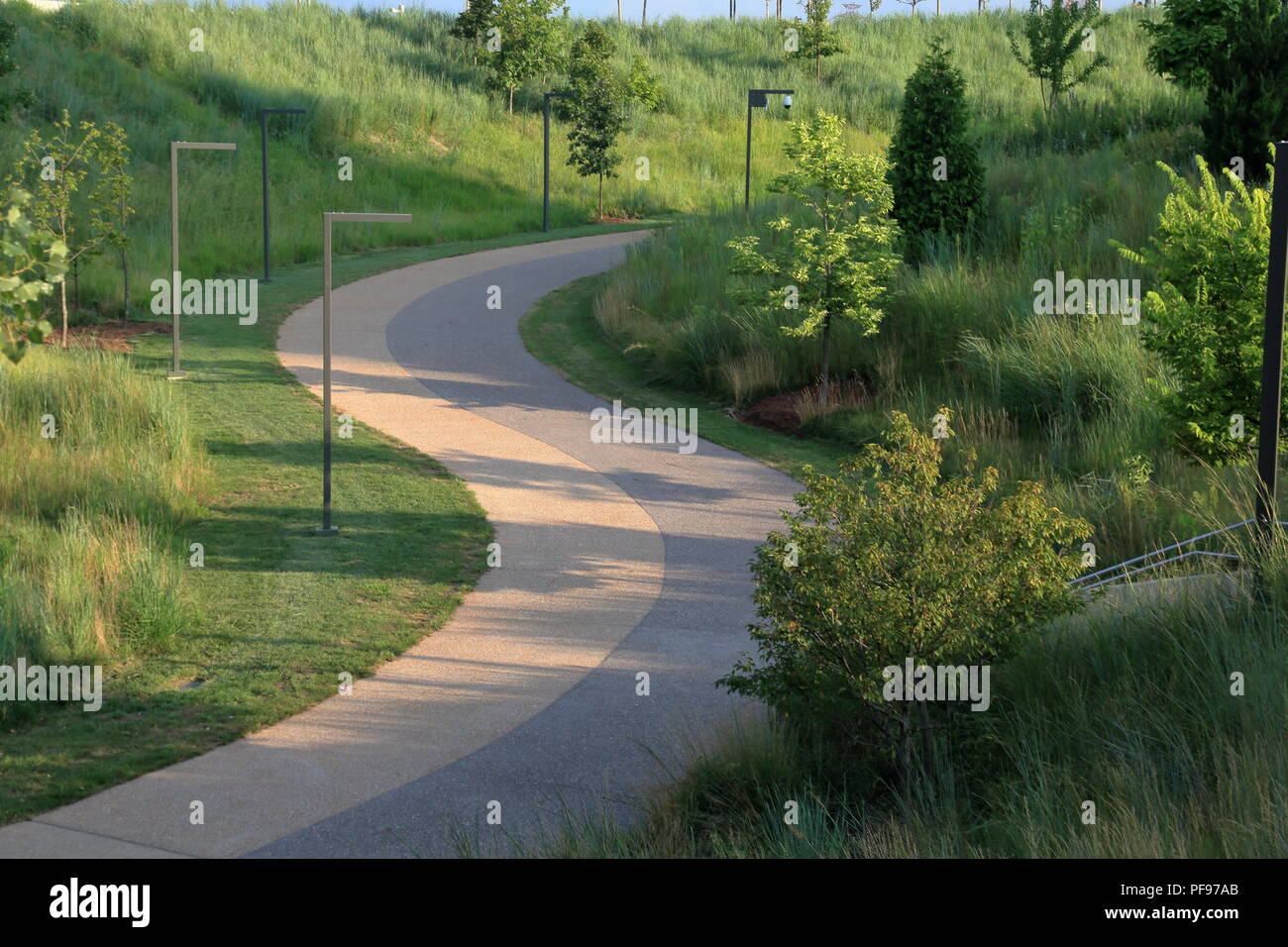 Winding path through Gateway Arch National Park area in downtown Saint ...
