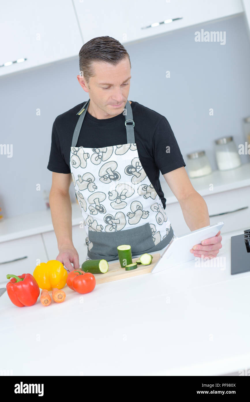 chef man cooking in the kitchen Stock Photo - Alamy