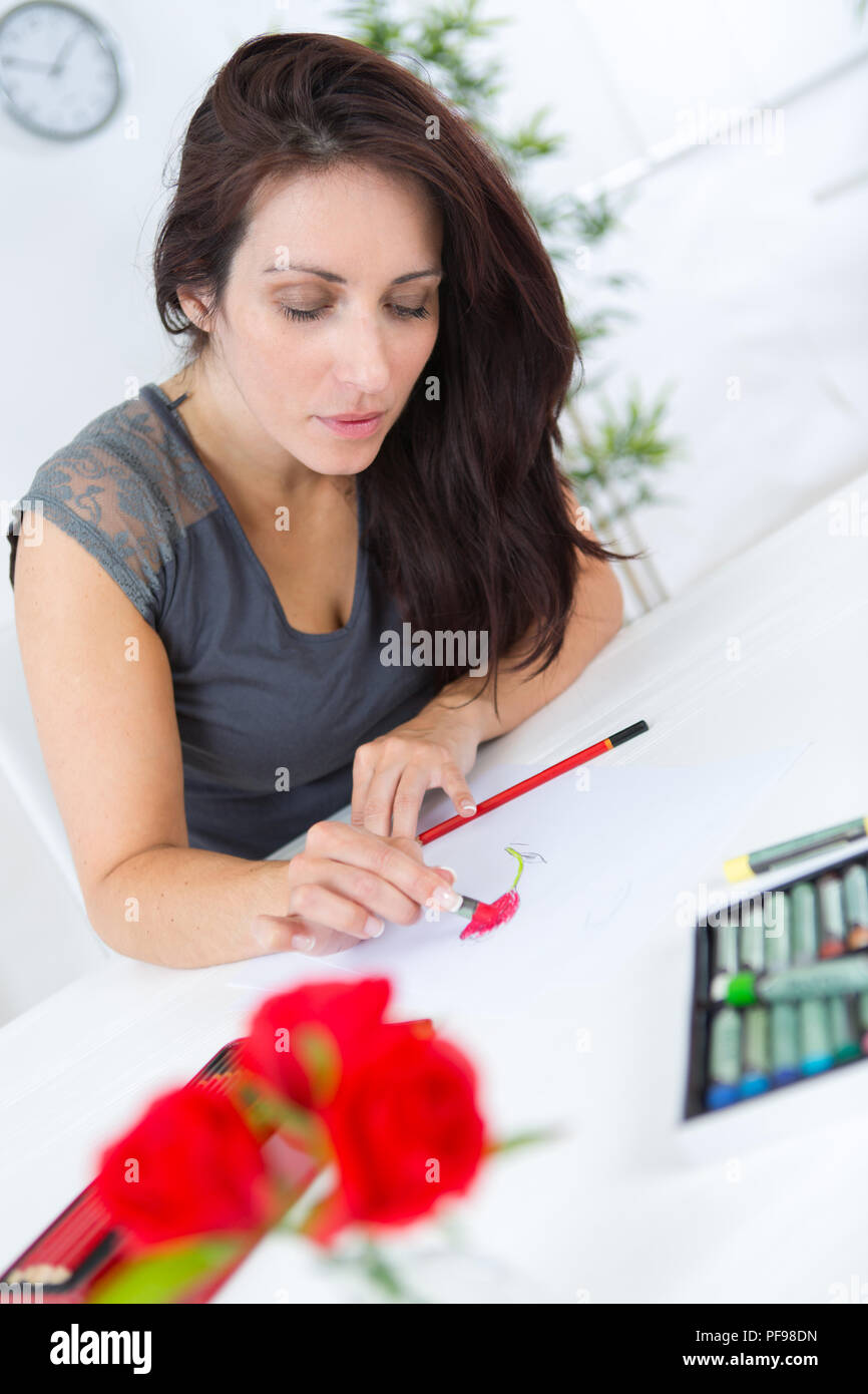 female drawing creative business sketch in notepad Stock Photo - Alamy