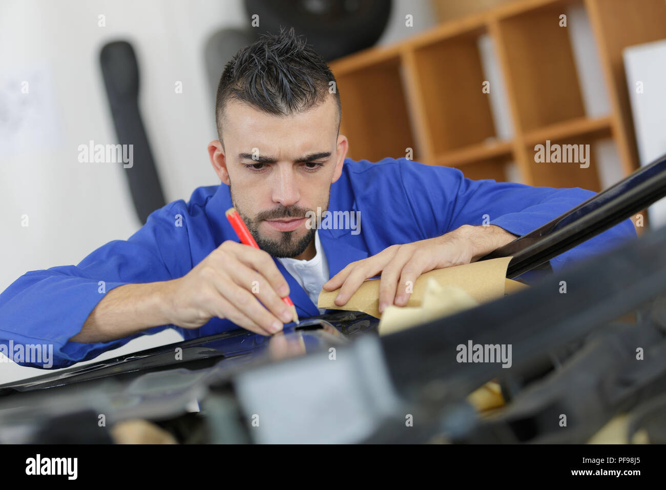 mechanic fixing a car engine Stock Photo - Alamy