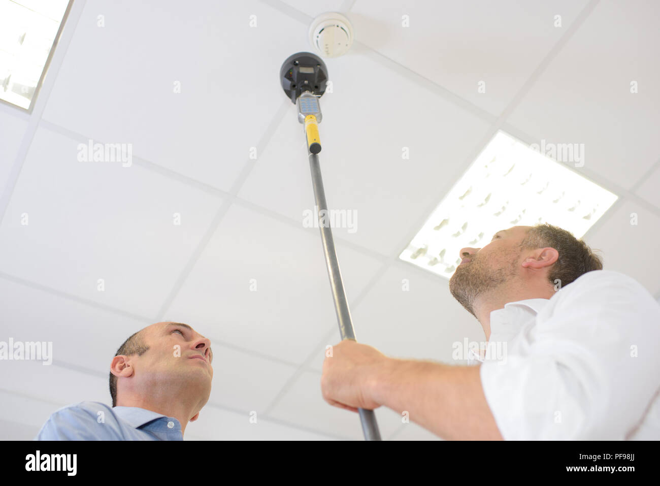 testing the smoke detector Stock Photo - Alamy