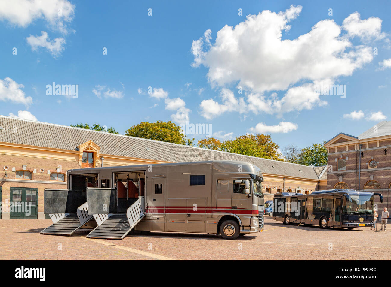 Courtyard with Royal horse trailer and blue coach at The Royal Stables ...