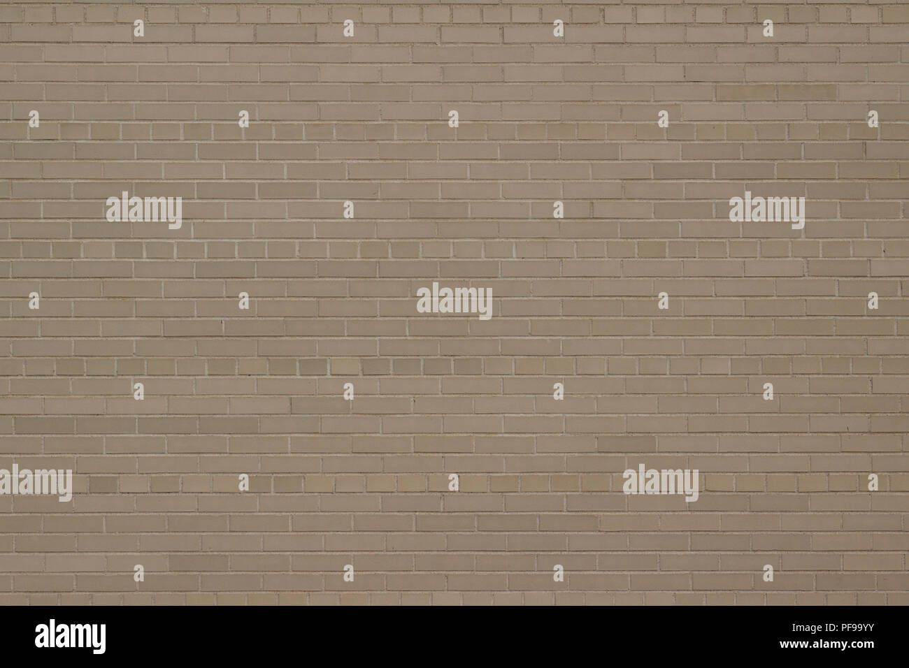 Attractive weathered light grey or beige brick wall background with a ...