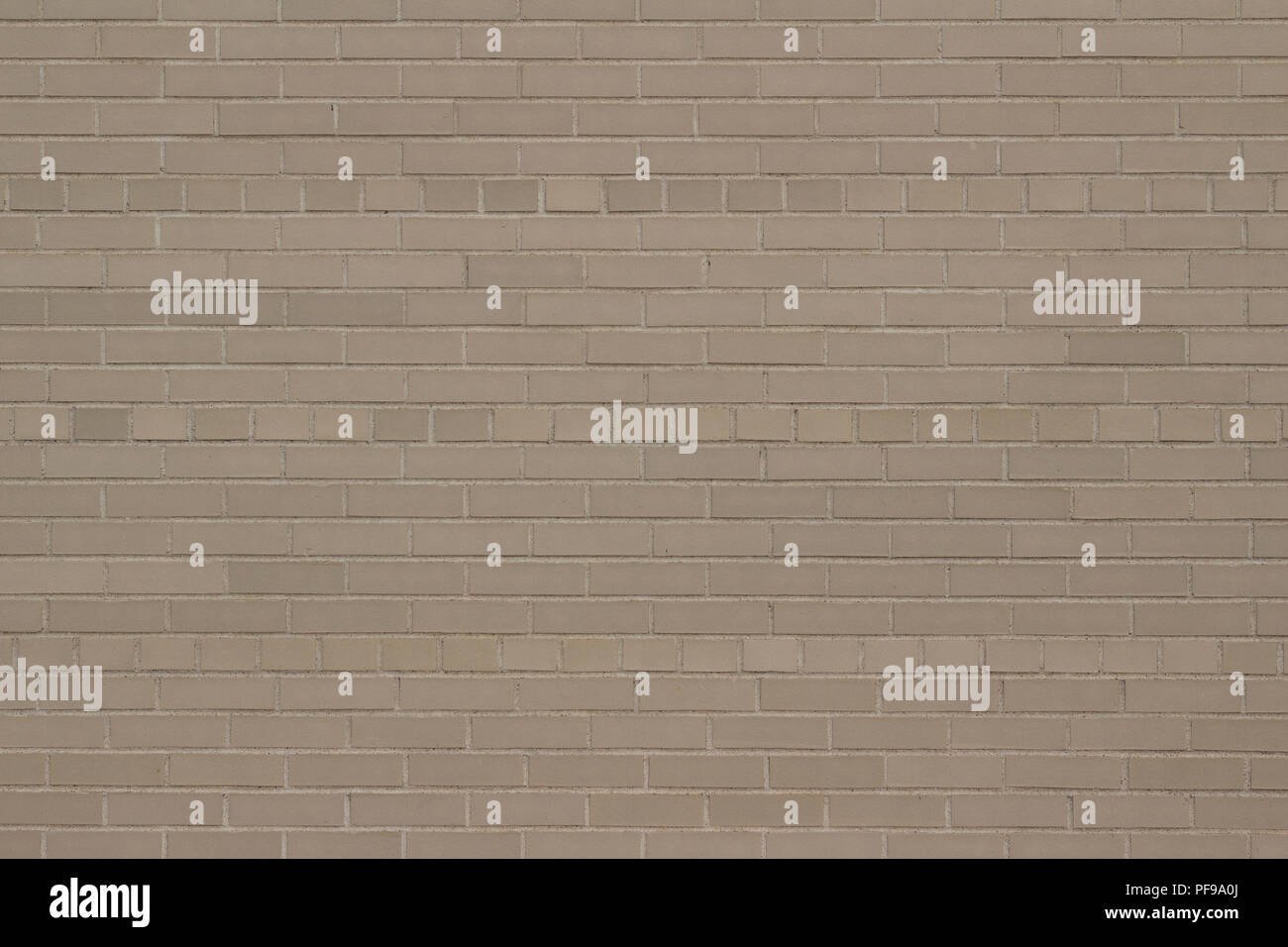 Attractive weathered light grey or beige brick wall background with a ...