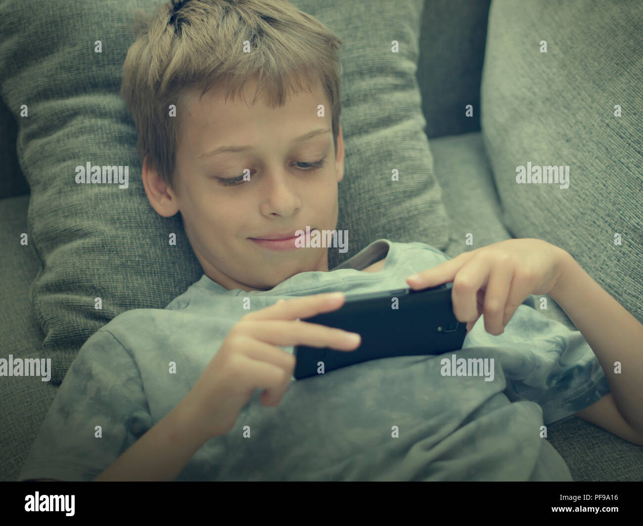 boy playing video games Stock Photo - Alamy