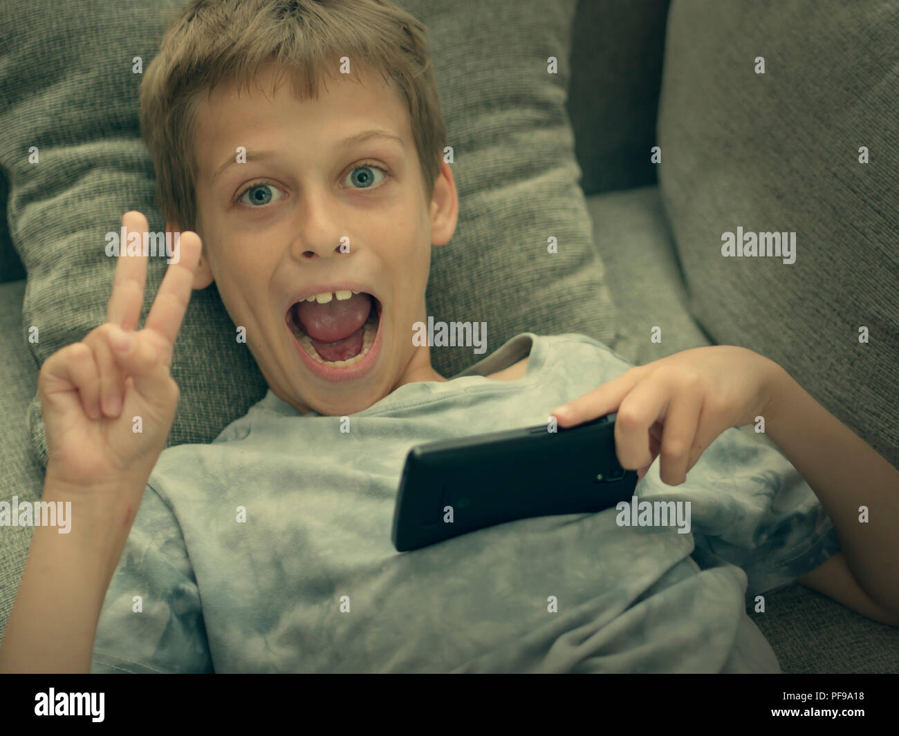 boy playing video games Stock Photo - Alamy