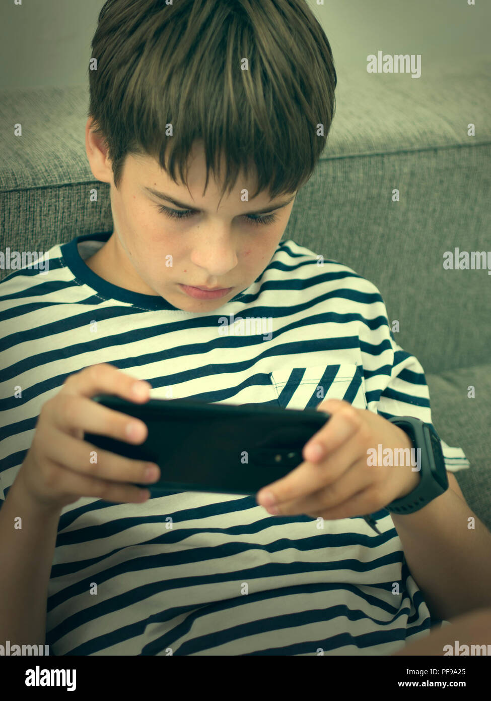 teenage boy with cellphone Stock Photo - Alamy