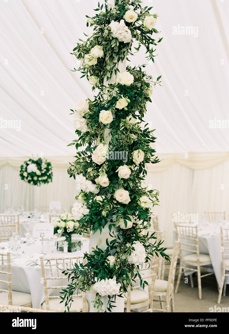 White flower wreath maypole garland decoration in a wedding marquee uk ...