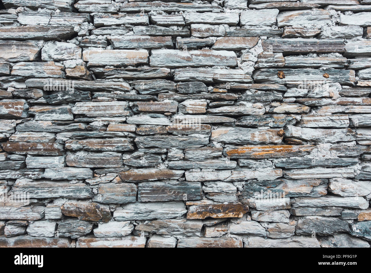 Old grey stone wall texture Stock Photo - Alamy
