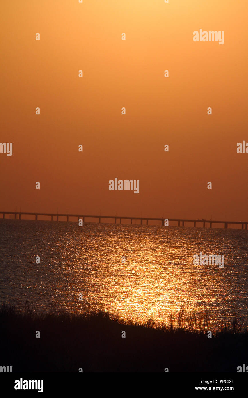 Virginia Beach, USA. Sunset with view of Chesapeake Bay Bridge–Tunnel ...
