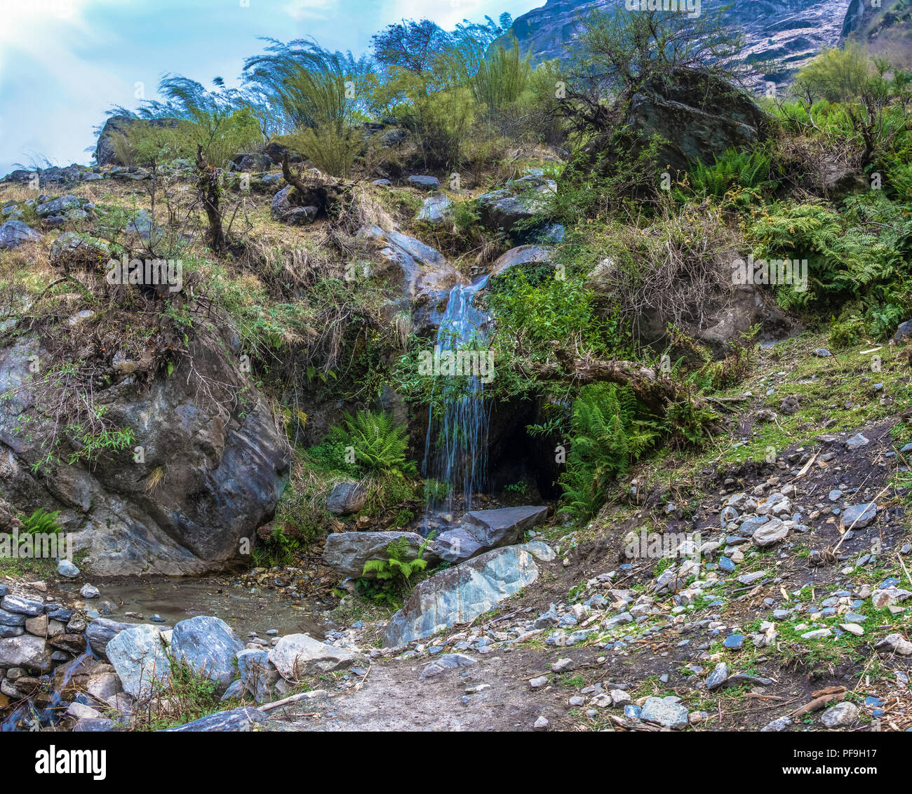 Beautiful small waterfall on spring day in Himalayas, Nepal Stock Photo ...