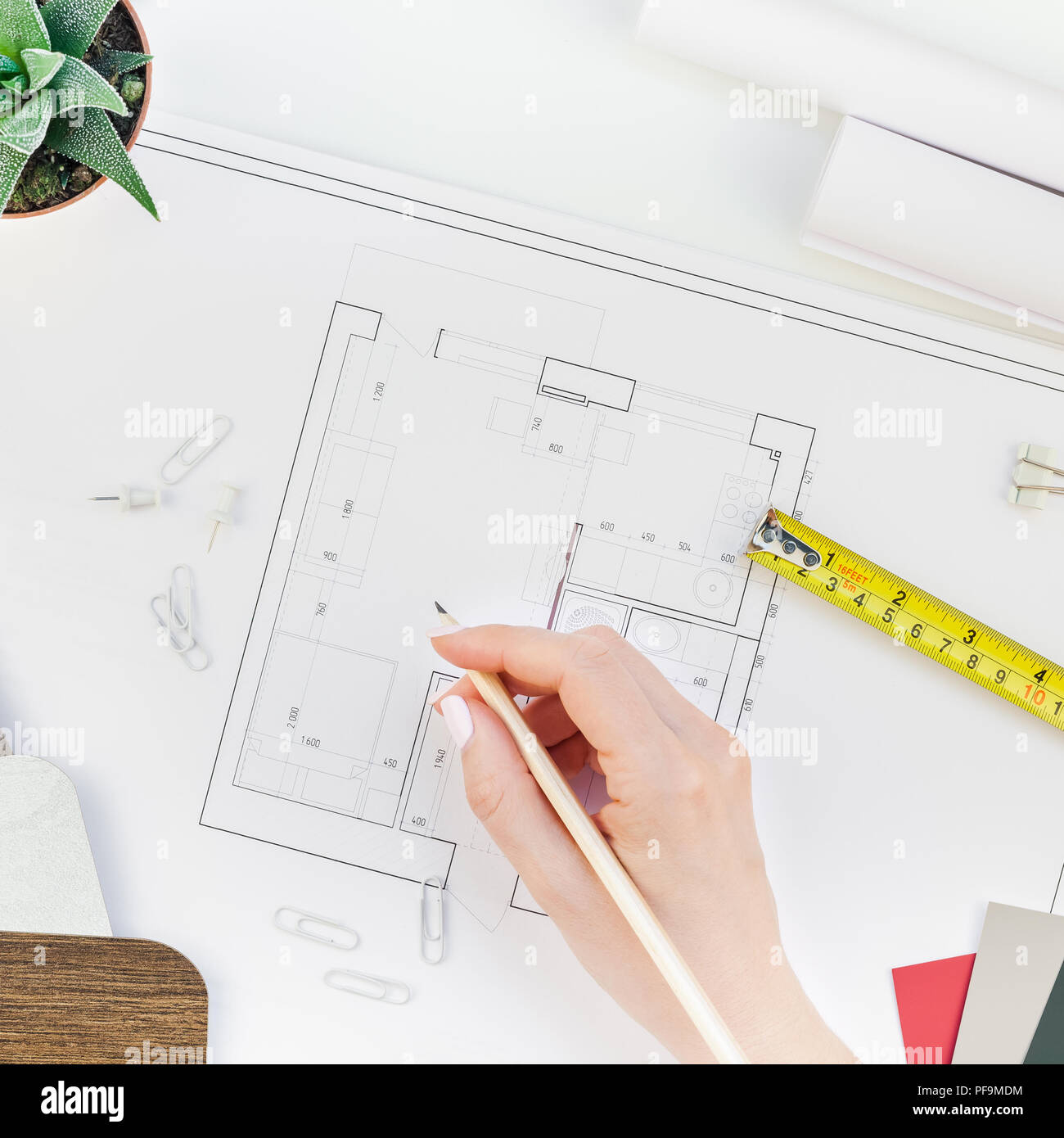 Creative flat lay overhead top view blueprints architectural flat ...