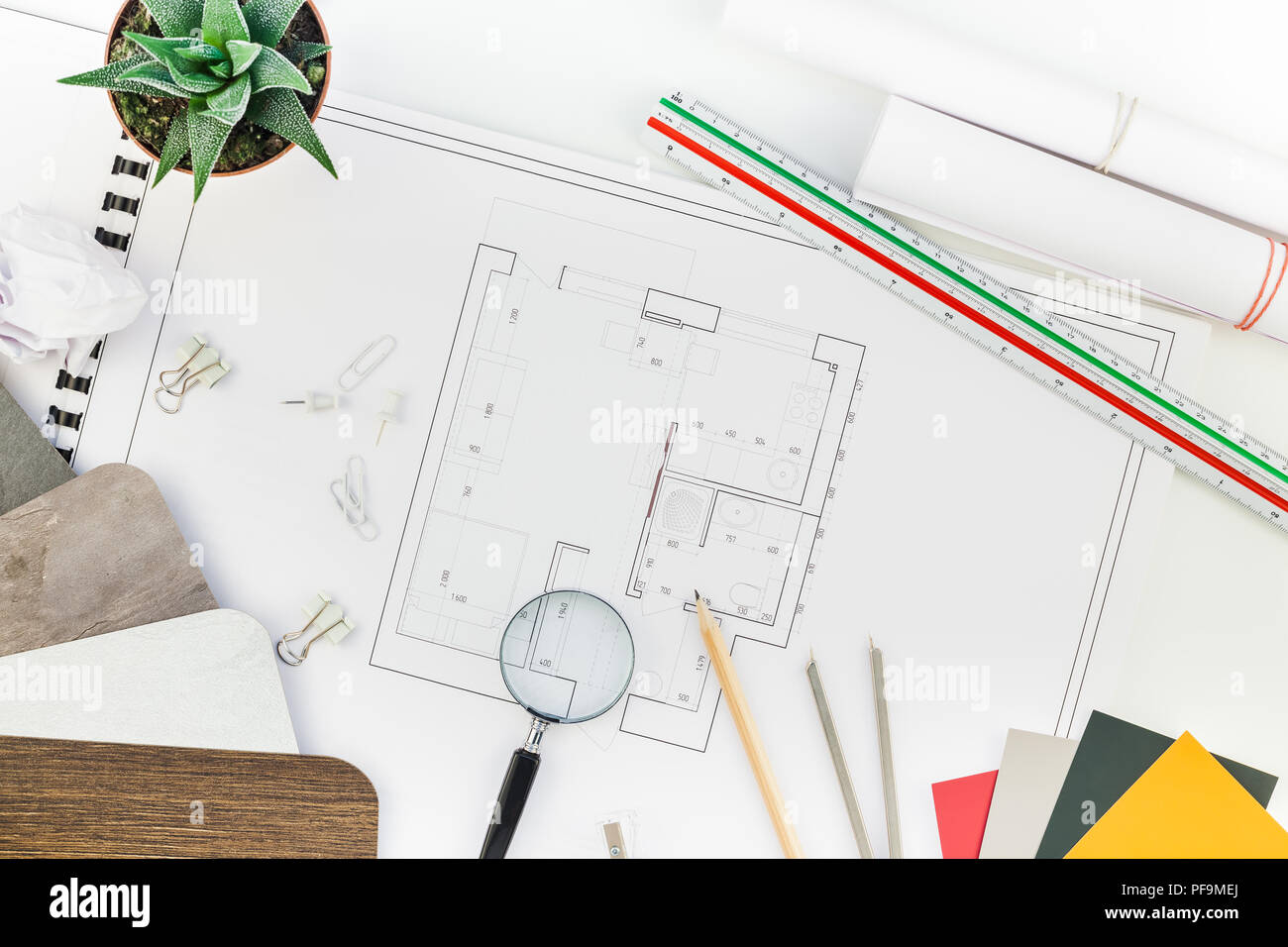 Creative flat lay overhead top view blueprints architectural flat ...