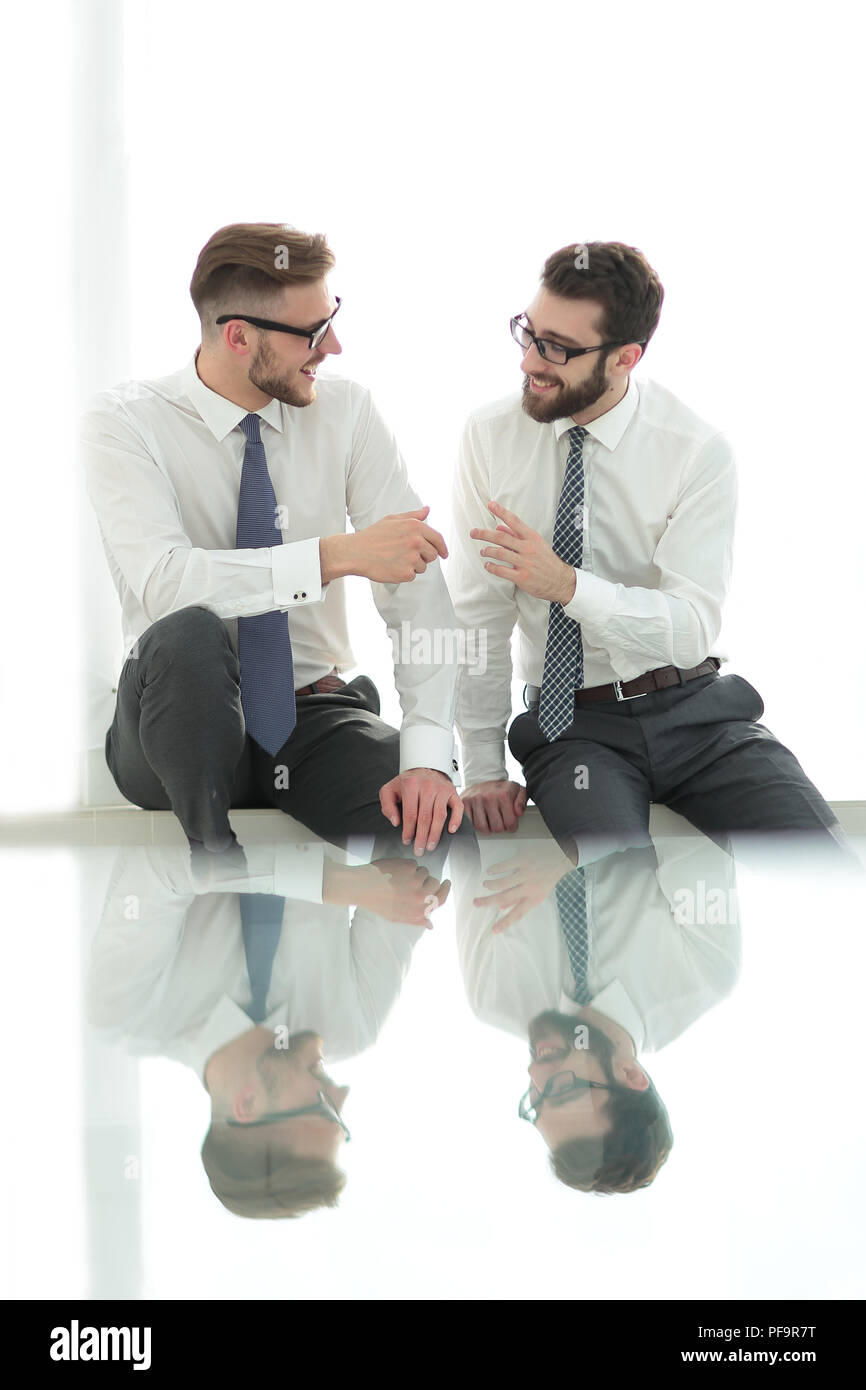 business colleagues talk in an empty office Stock Photo - Alamy