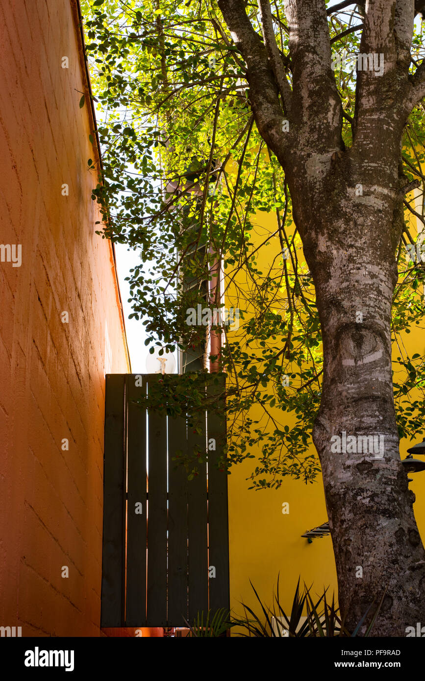 wood fence between two buildings Stock Photo - Alamy
