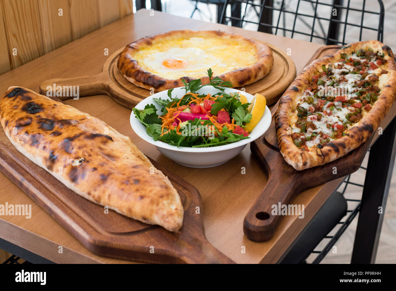 Variety of Turkish Pide Traditional food with beef, Cheese, Fried Egg ...