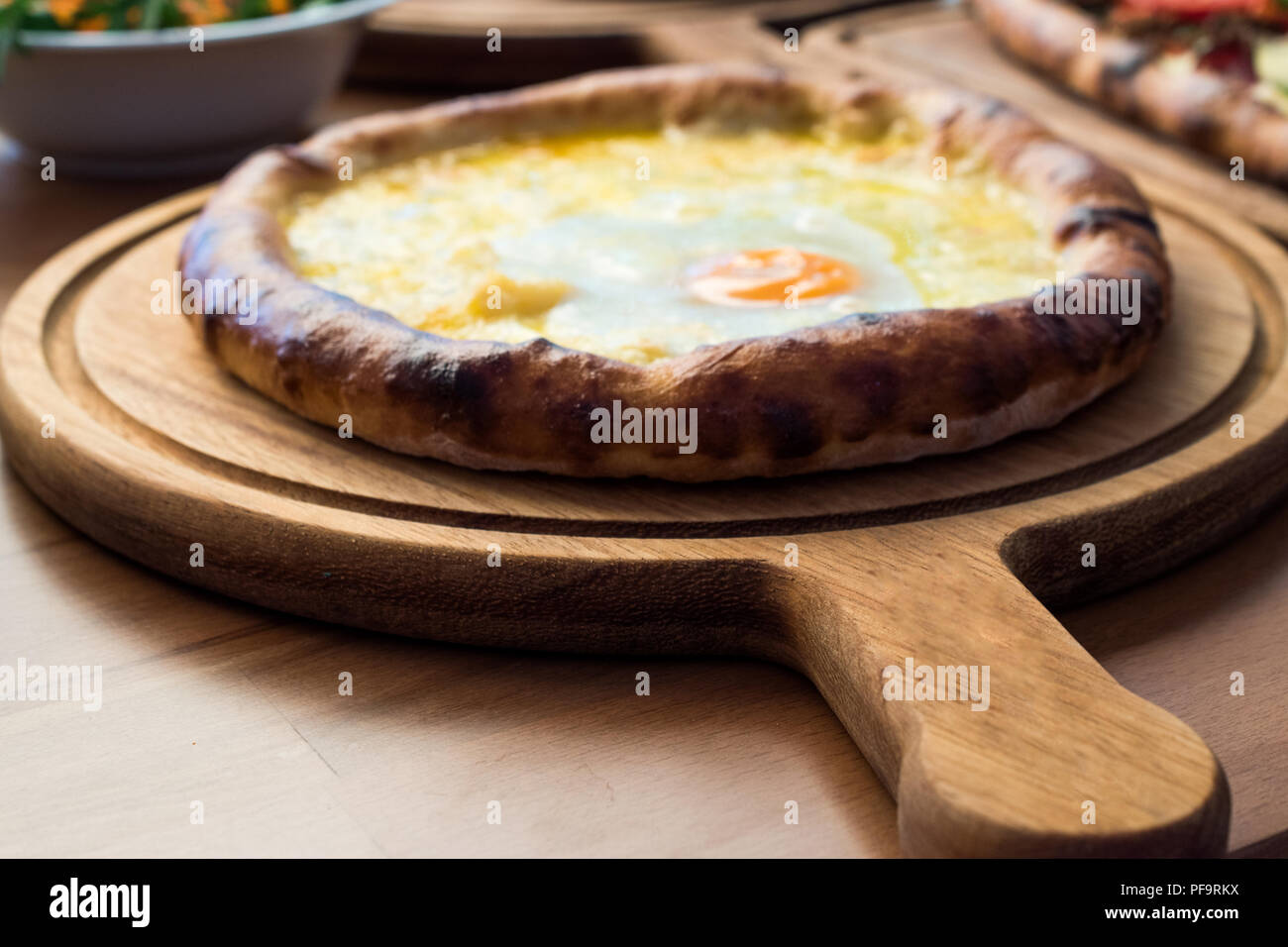 Turkish Round Pide with Fried Egg and Cheese. Traditional Food Stock ...
