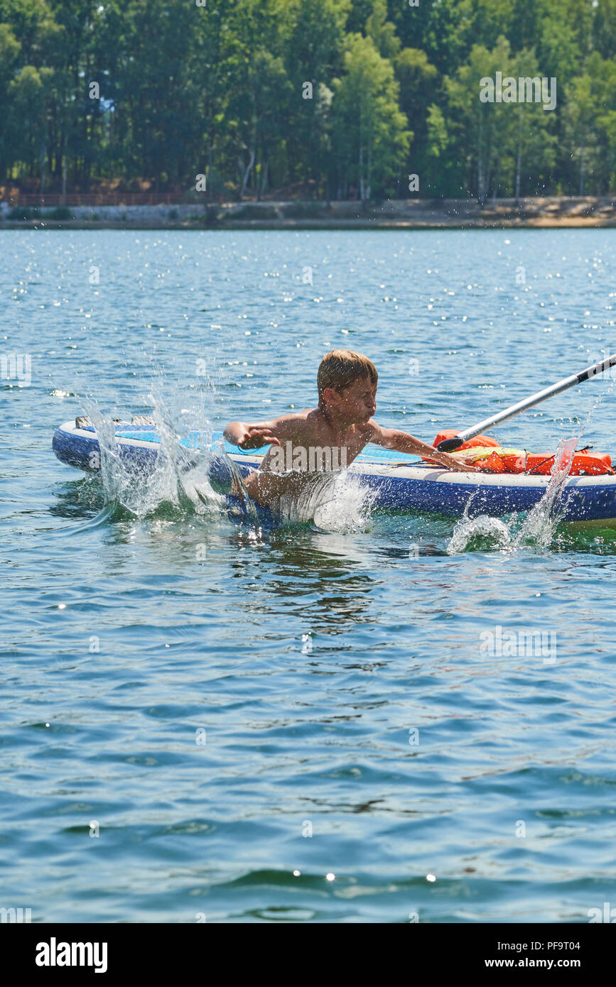 Boy falling water hi-res stock photography and images - Alamy