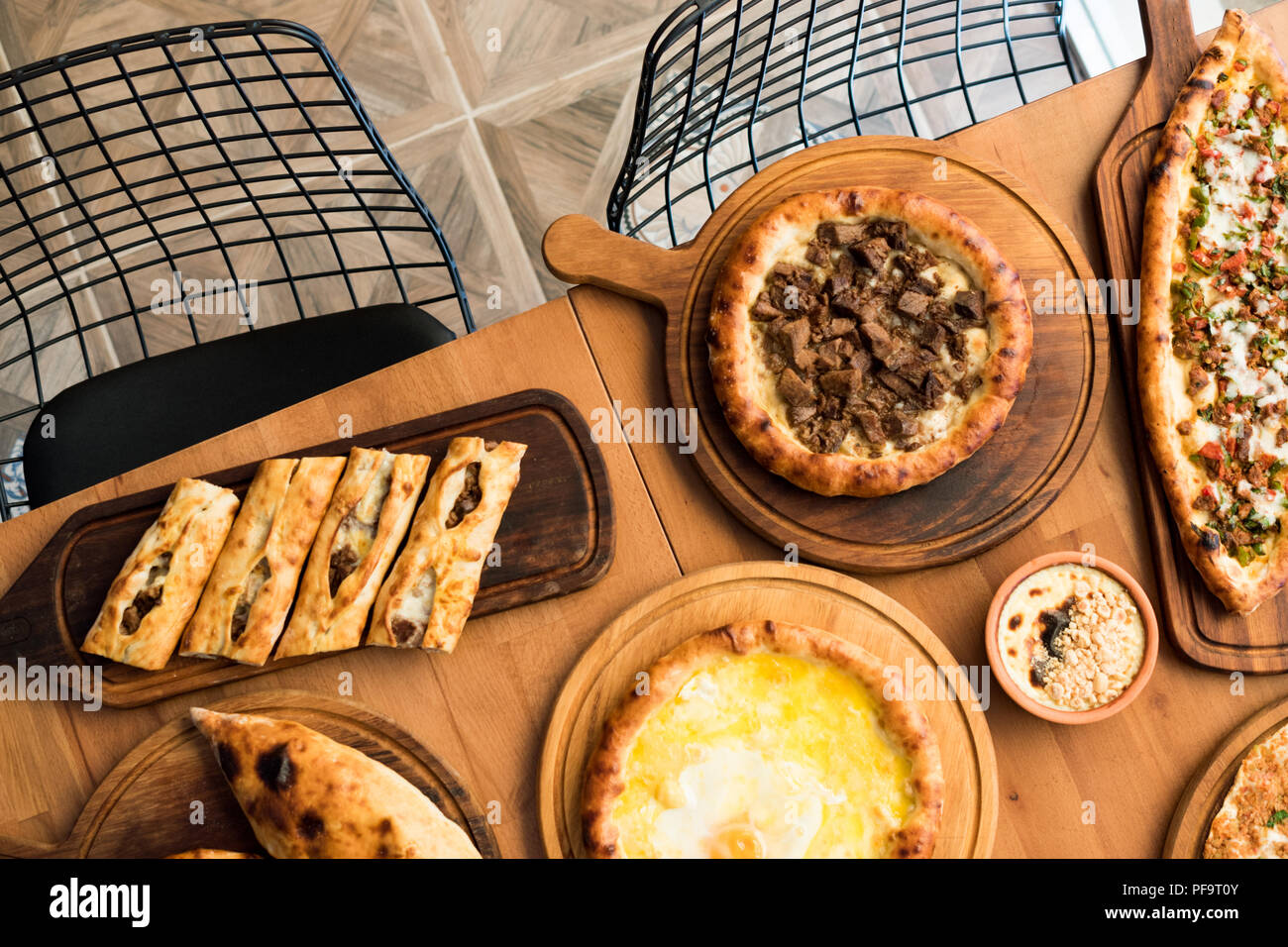 Variety of Turkish Pide Traditional food with beef, Cheese, Fried Egg ...